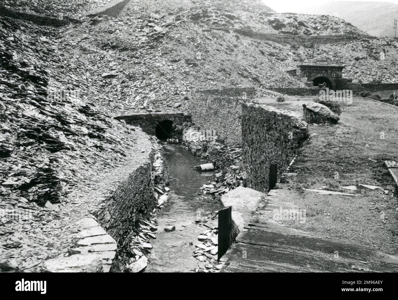 The remains of a slate quarry in North Wales, with a mountain of slate ...