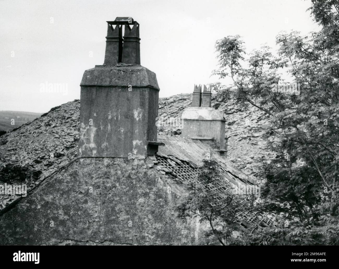 View of a derelict building in a slate quarrying area of North Wales ...