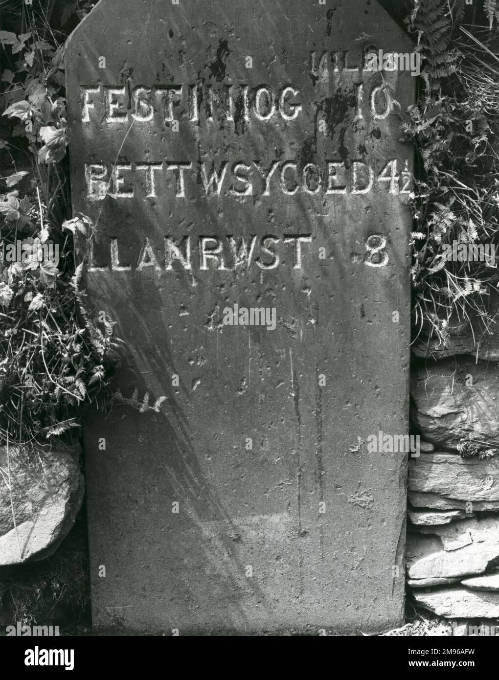 A slate milestone, probably early 19th century, near Penmachno, Betws-y ...