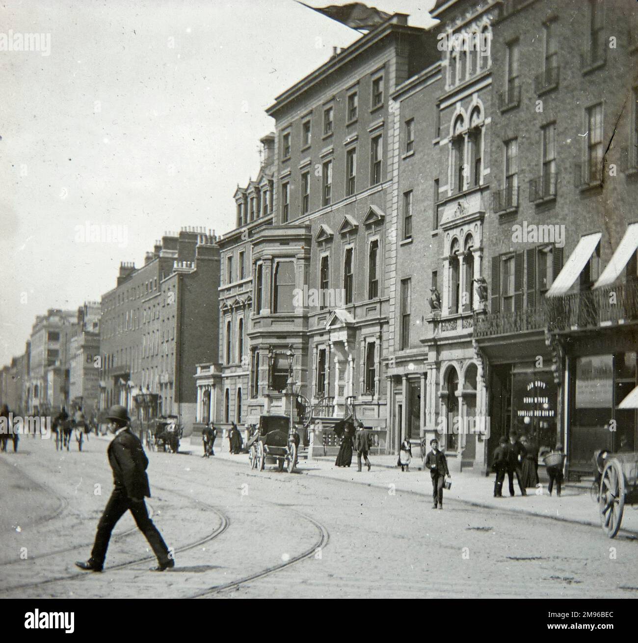 A street scene in Edinburgh, Scotland, with pedestrians and traffic ...