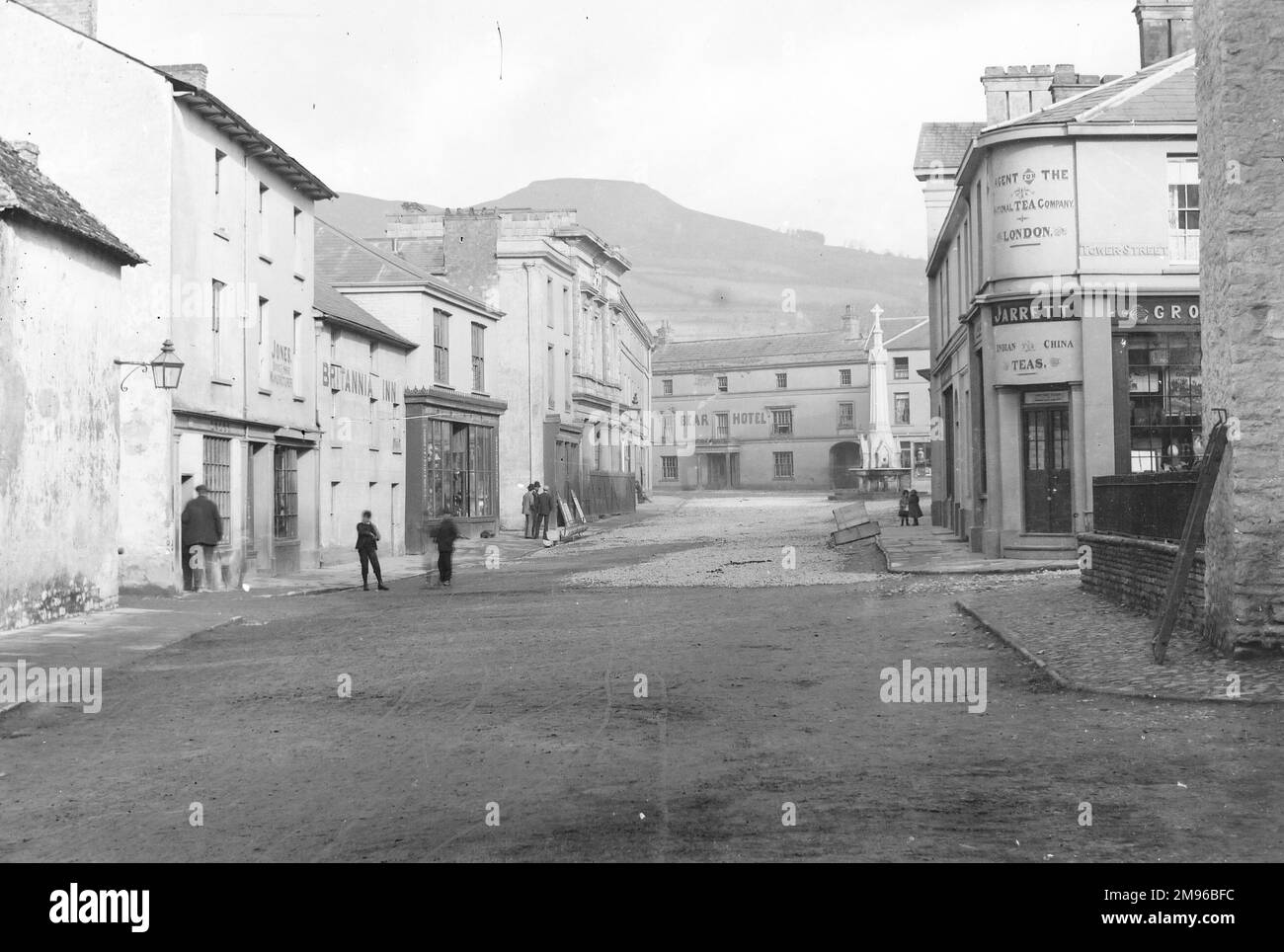 A view up the High Street in the town centre, Crickhowell, Powys, Mid Wales, showing the Bear ...