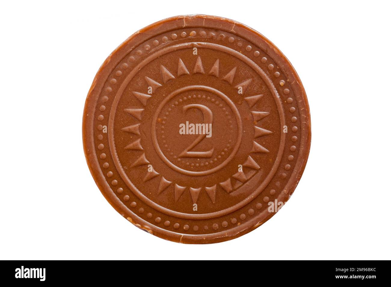 M&S Golden Coins made from solid milk chocolate unwrapped isolated on ...