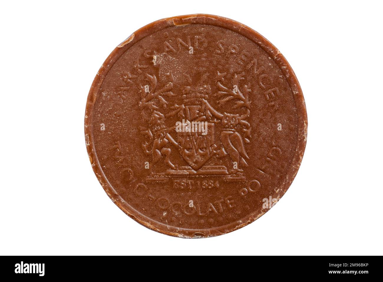 M&S Golden Coins made from solid milk chocolate unwrapped isolated on ...