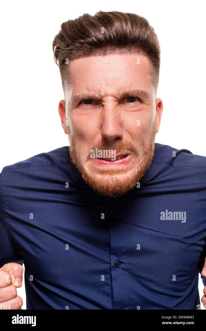 Attractive young man wearing blue shirt, isolated over a white ...