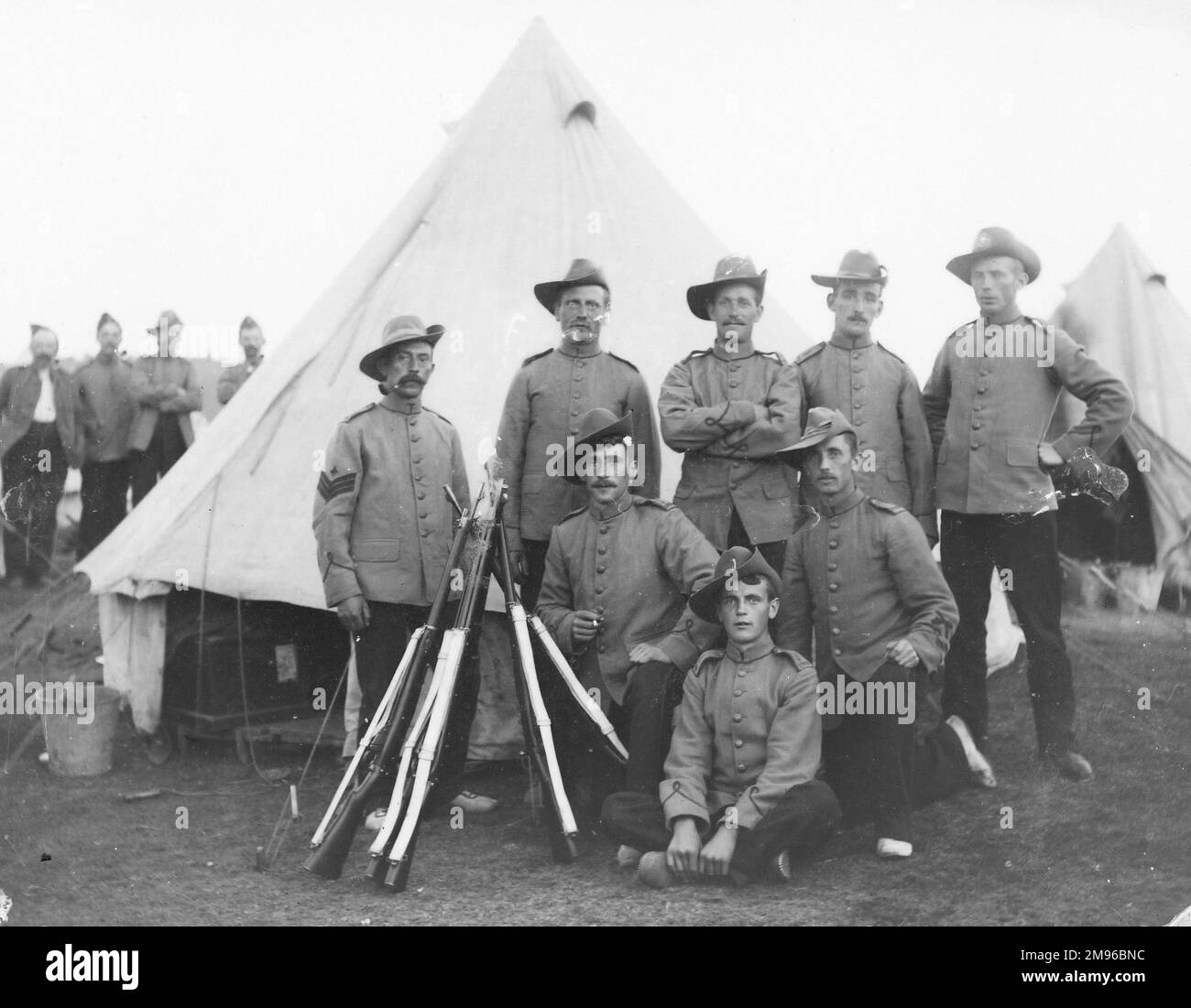 Group men stands on Black and White Stock Photos & Images - Alamy