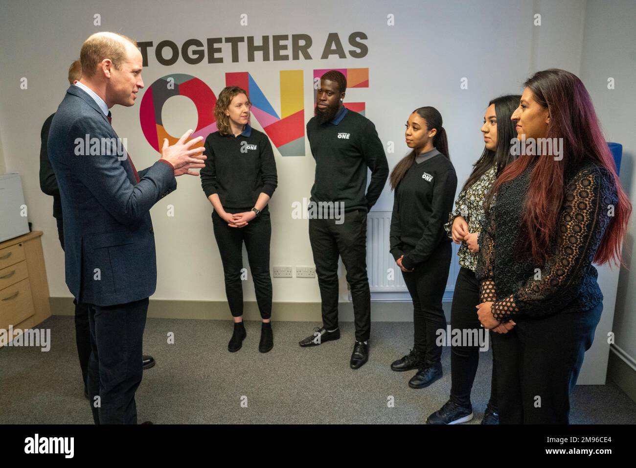 The Prince of Wales (left) during his visit to Together as One (until recently known as Aik ...