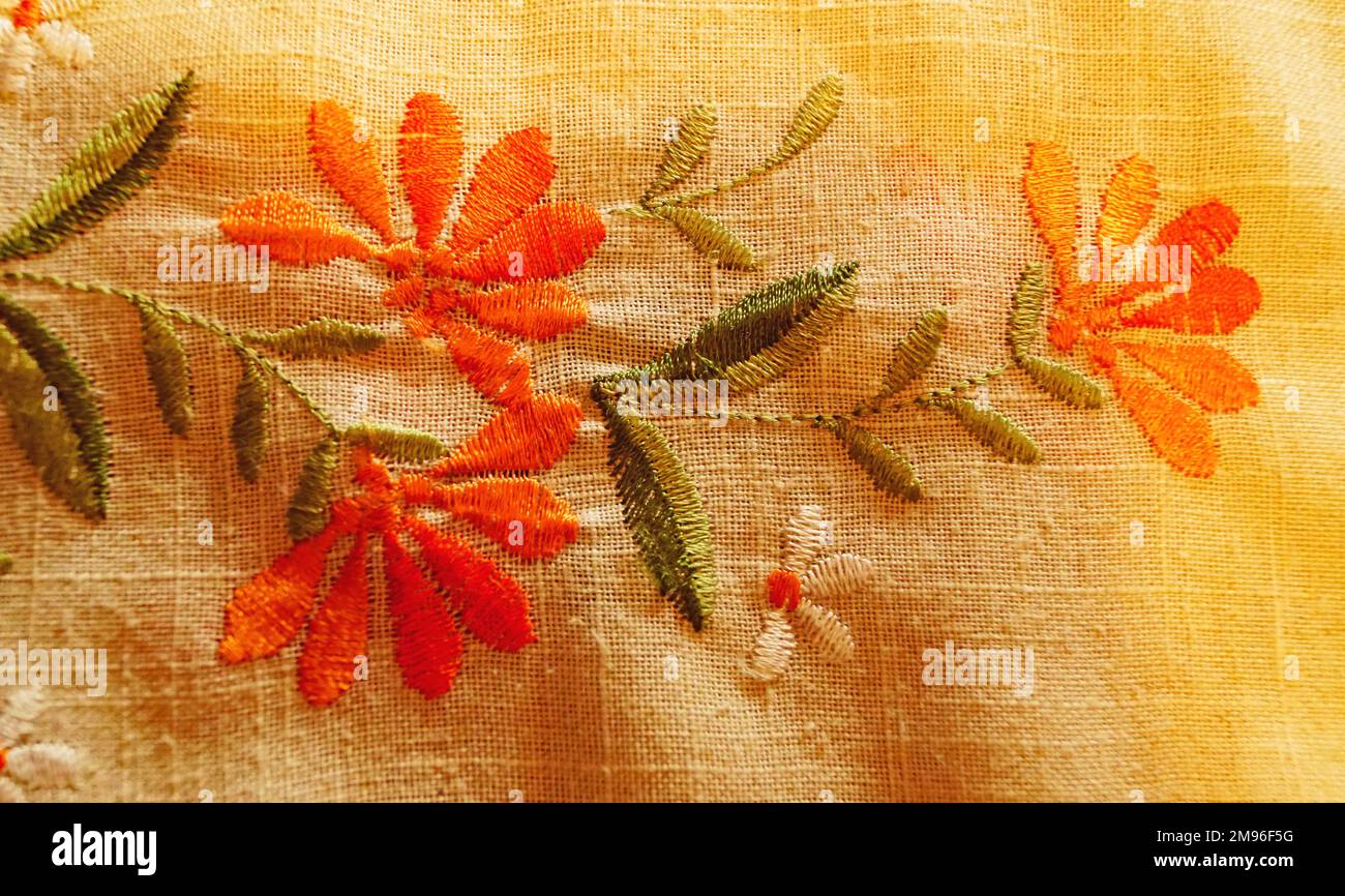 Embroidery of flowers on a fabric Stock Photo - Alamy