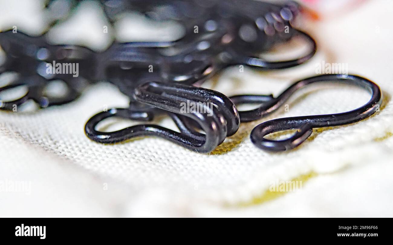 Metal square brackets or clips on white background Stock Photo - Alamy
