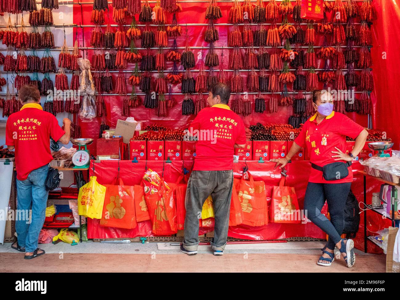 Market stall selling Chinese dried cured sausages for Chinese New Year ...