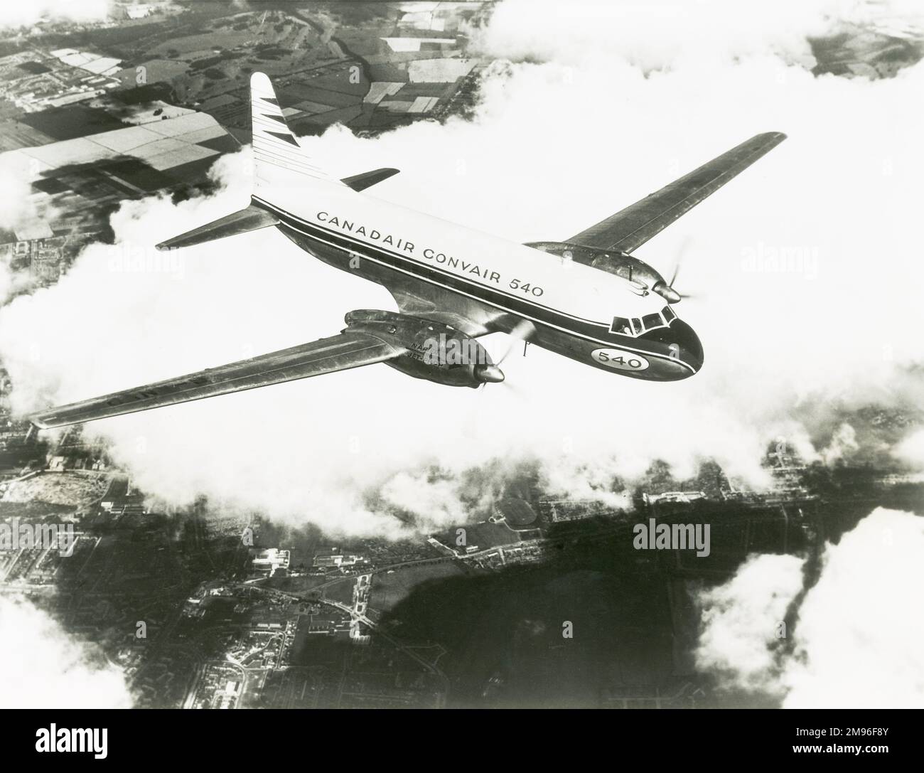 Canadian Convair 540 short medium range airliner in flight Stock Photo ...