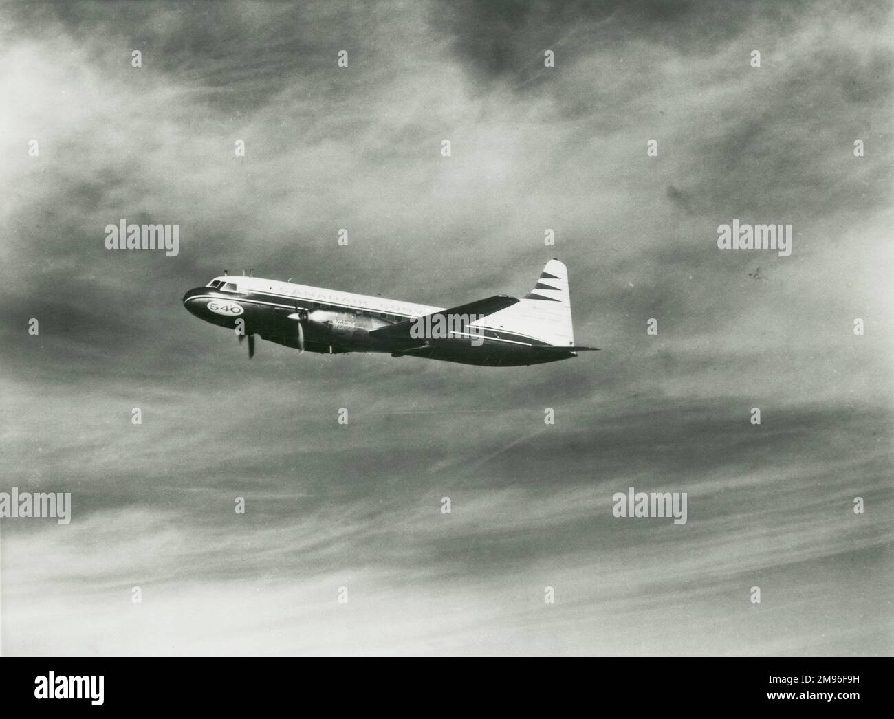 Canadian Convair 540 short medium range airliner in flight Stock Photo ...