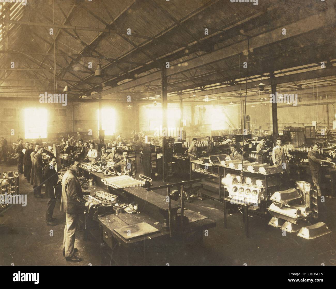 Workshop during the assembly of Lion engines Stock Photo - Alamy