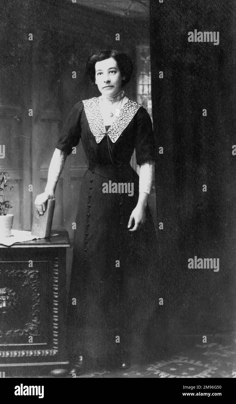 Wearing full length dress with decorative collar button detail hi-res stock photography and ...