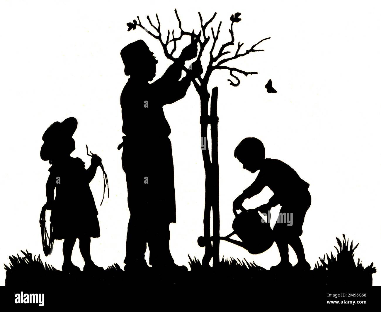 A father and his two children tend to the garden, pruning and watering ...