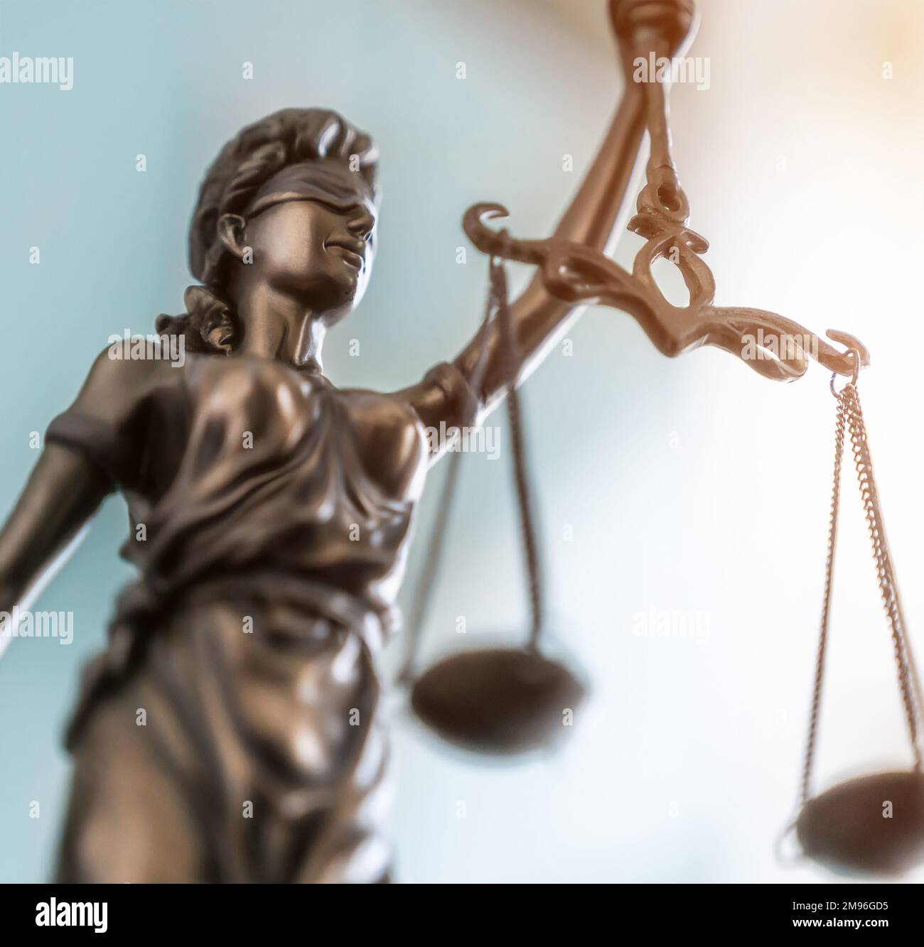 Statue of lady justice on bright background - Side view with copy space ...