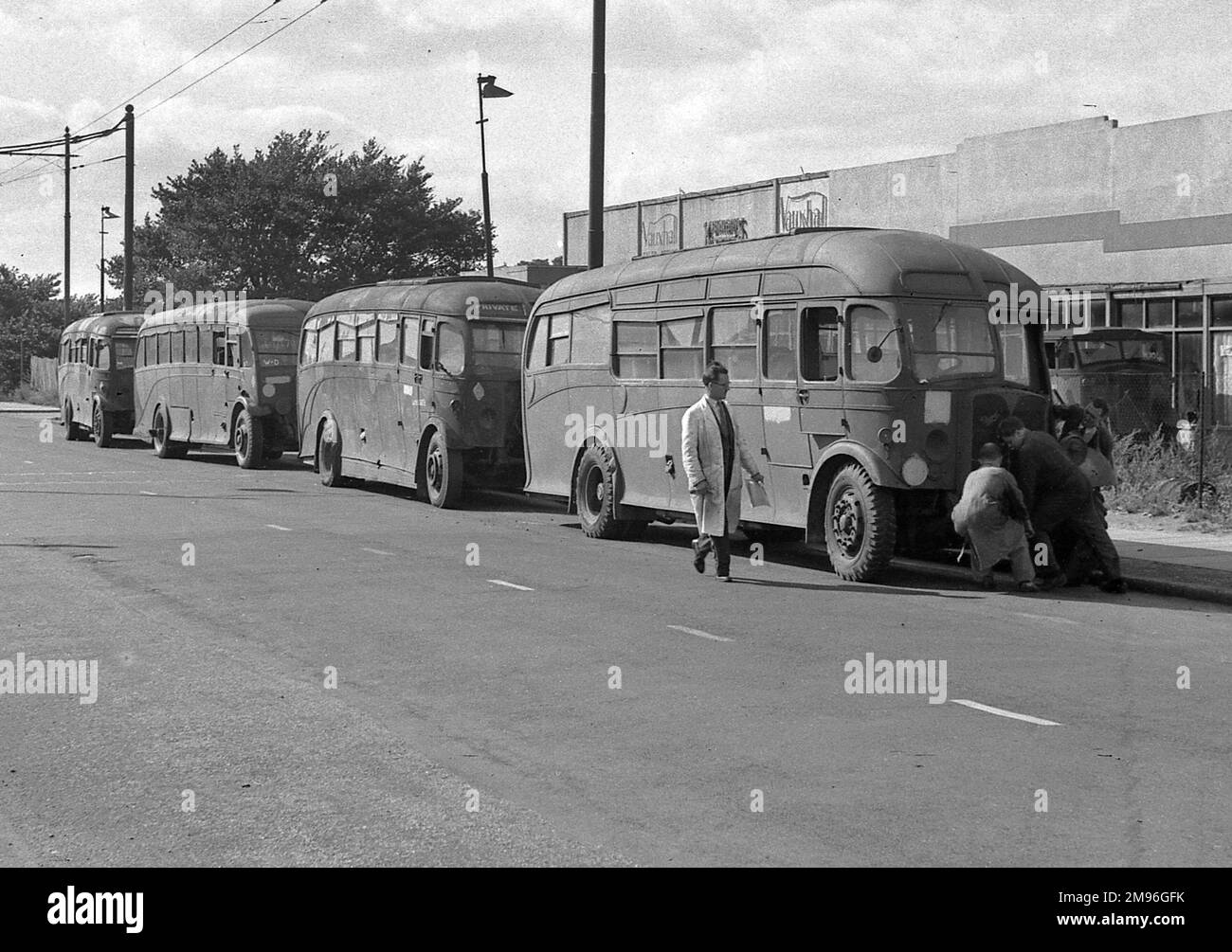 Four coaches Black and White Stock Photos & Images - Alamy