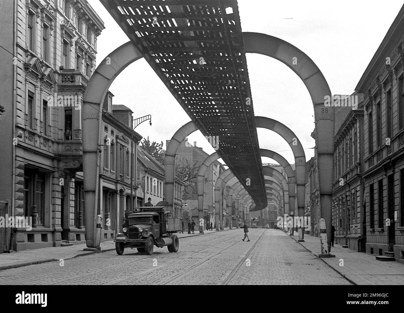 A road with a large overhead structure Stock Photo - Alamy