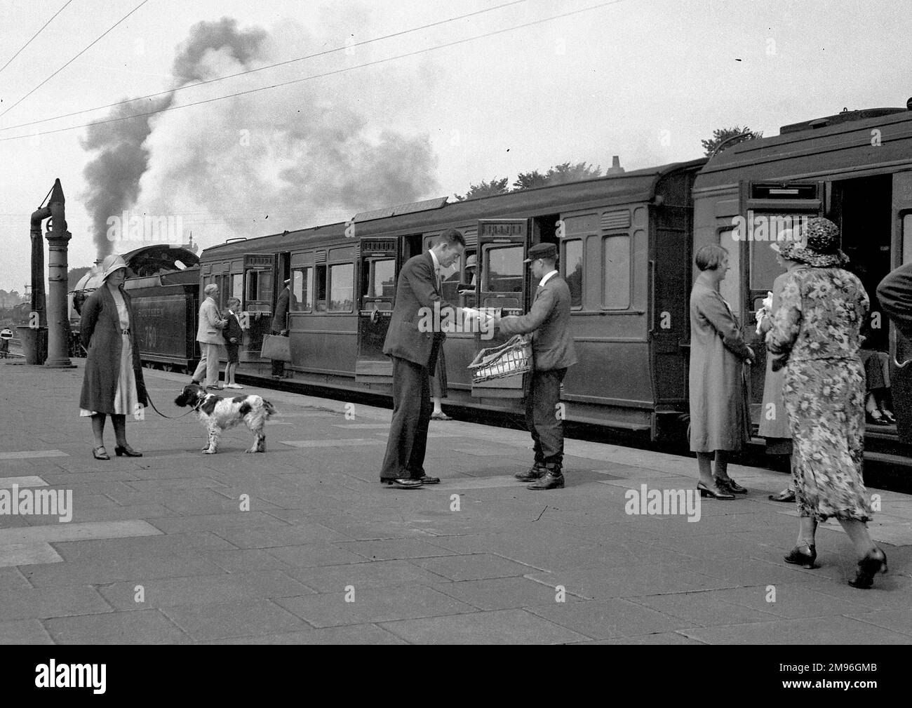 Scene on the platform at Salisbury Railway Station, with a steam train ...