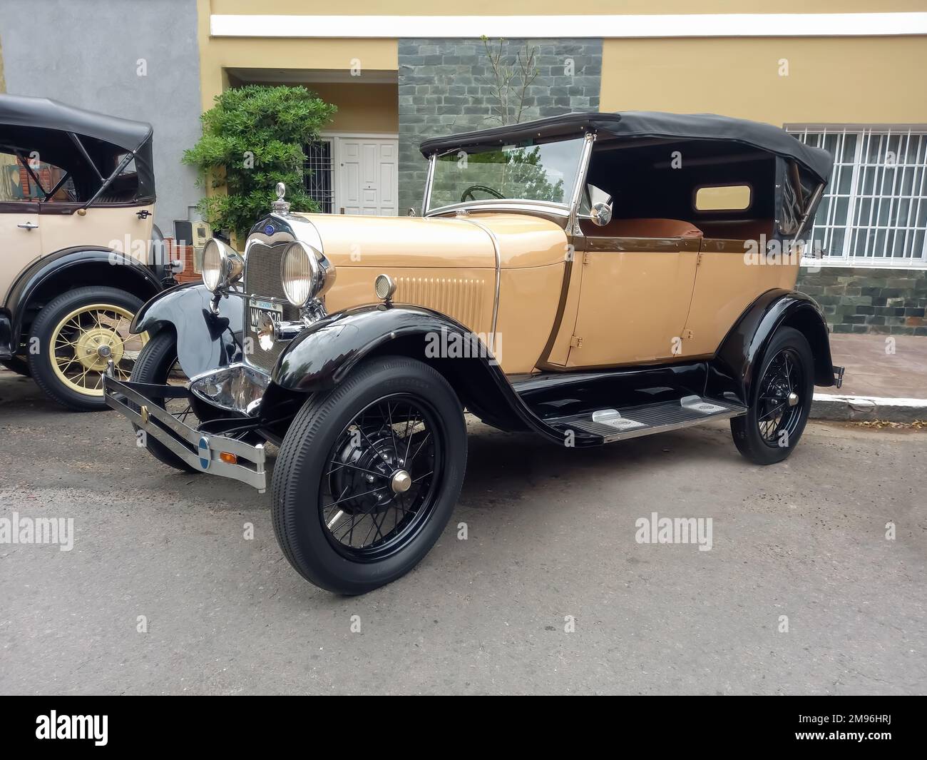 Old black and cream 1930s Ford Model A double phaeton convertible ...
