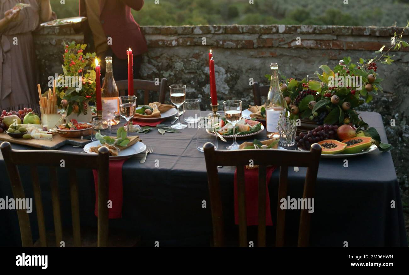 festive table setting dinner friends Stock Photo - Alamy