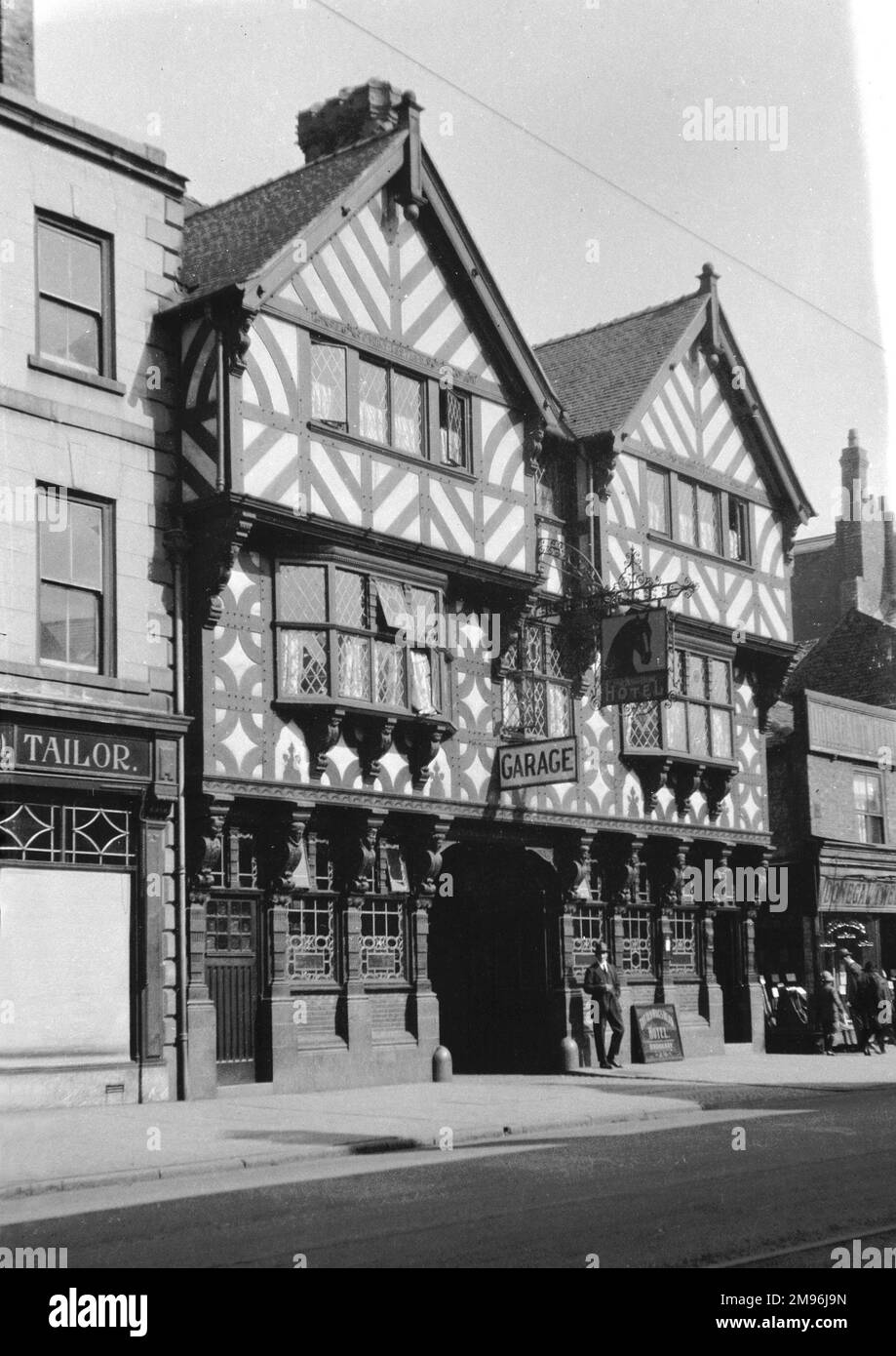 Street scene in an unidentified location, with the tudor-style Nag's ...