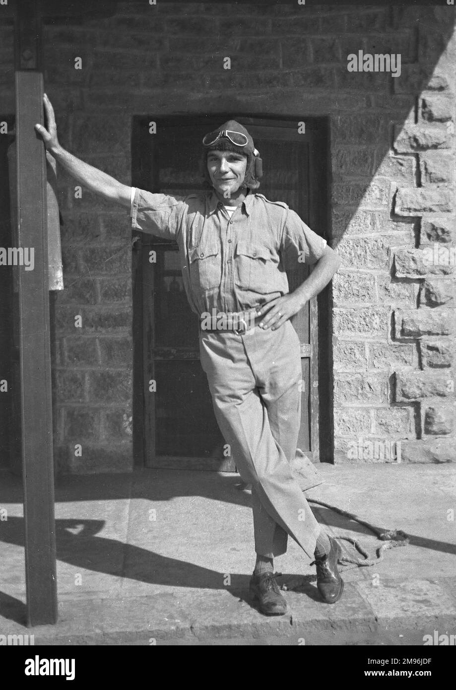 An airman posing for his photo on a sunny porch Stock Photo - Alamy