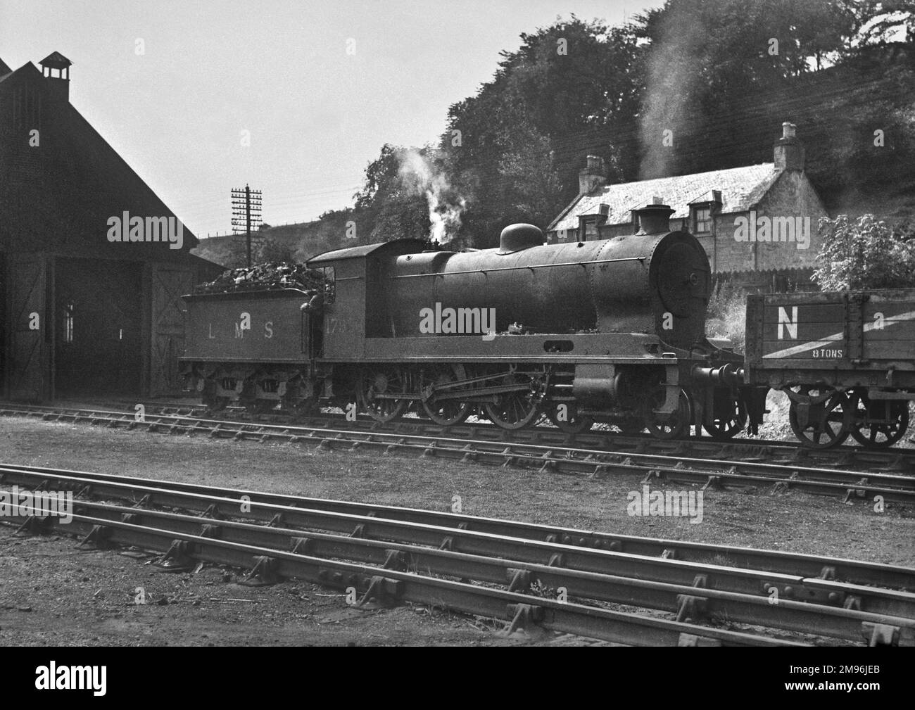 An LMS (London, Midland and Scottish) steam engine on a railway track ...