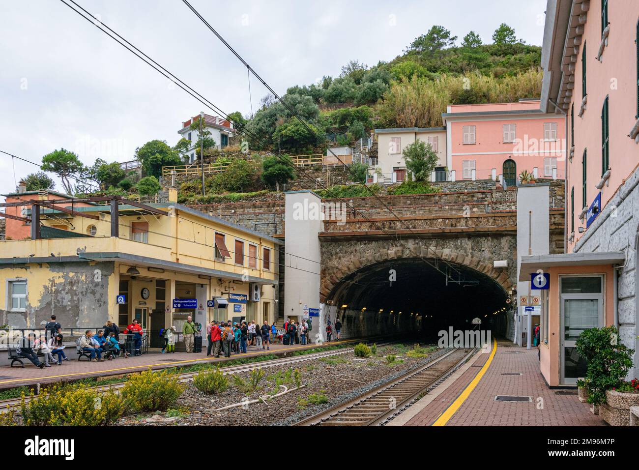 The station at Riomaggiore. The train line runs the length of the ...