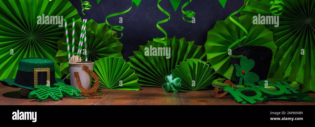 St. Patrick party invitation decorated background. Bar wooden table ...