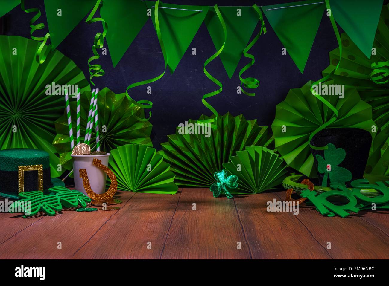 St. Patrick party invitation decorated background. Bar wooden table ...