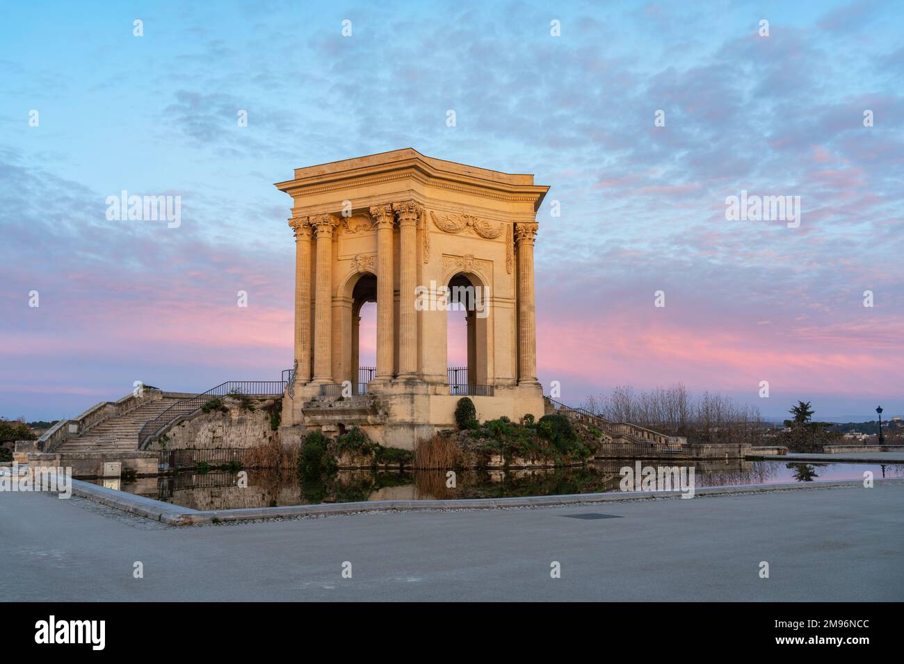 Colorful winter landscape view before sunrise of ancient water tower ...