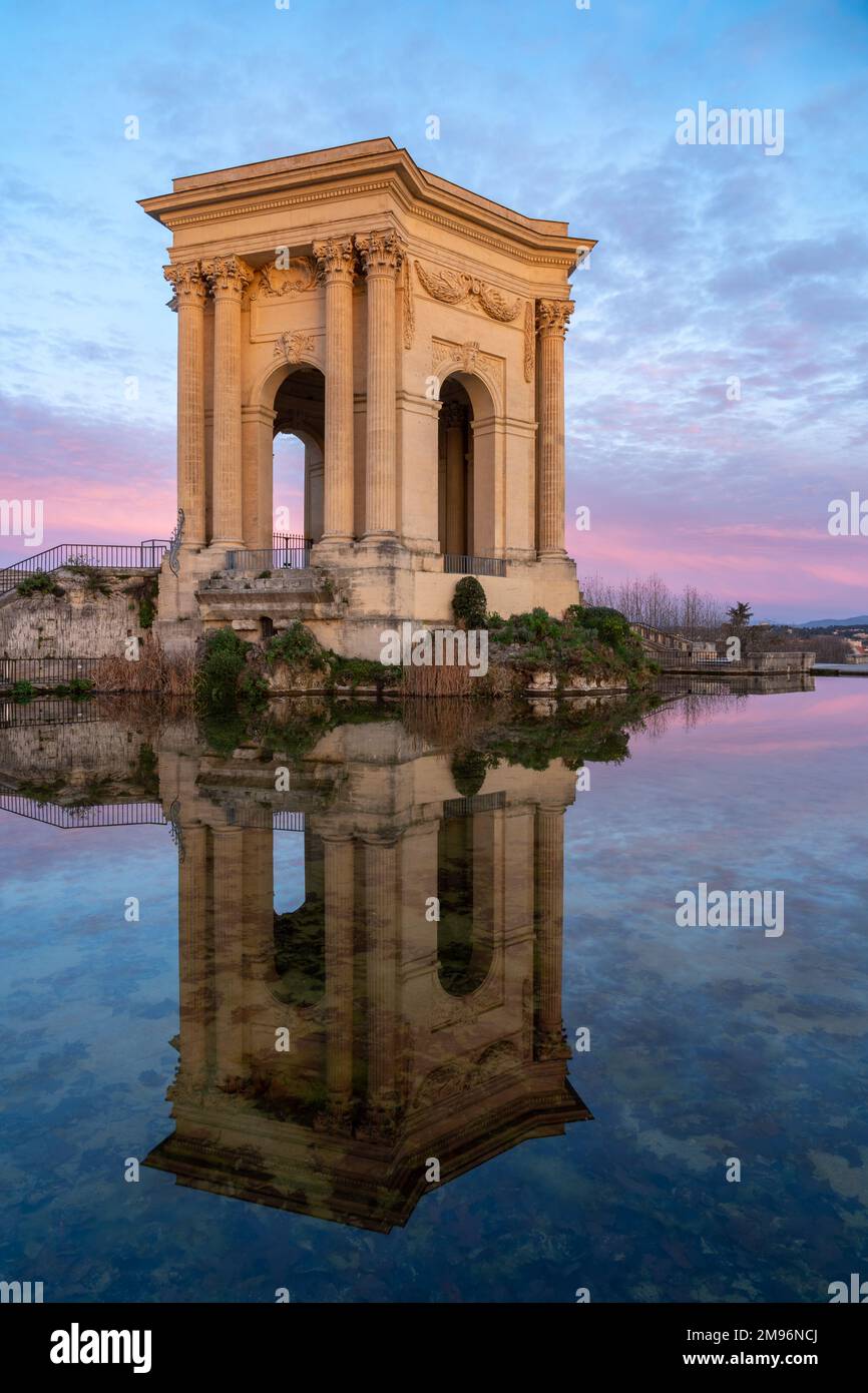 Colorful winter view before sunrise of ancient water tower stone ...