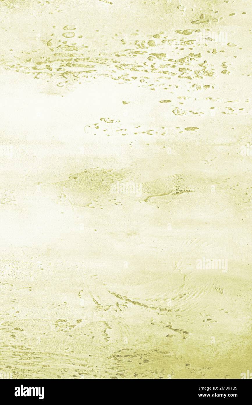 Light yellow green textured concrete background with light base darker ...