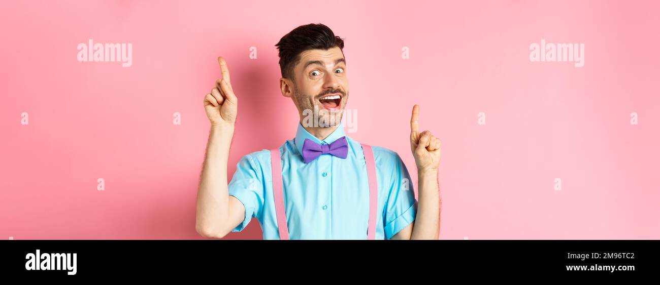 Cheerful guy with french moustache pitching an idea, dancing and ...