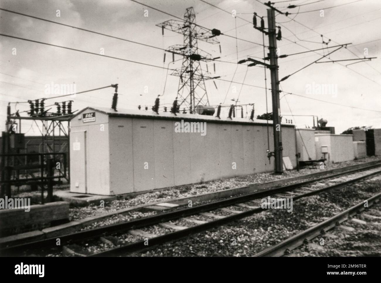 25kV feeder station with electricity overheads and tracks, c.1979 Stock ...