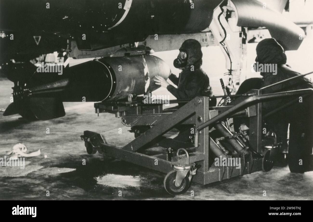 Loading of weapons on the Tornado aircraft in combat survival kit Stock ...