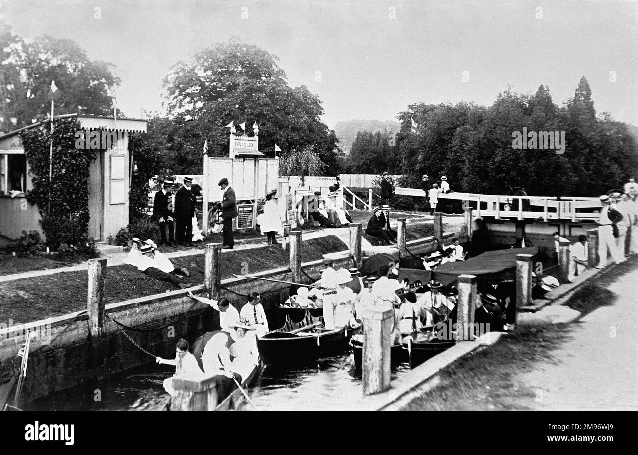 Busy scene at Shiplake Lock on the River Thames, probably taken early ...