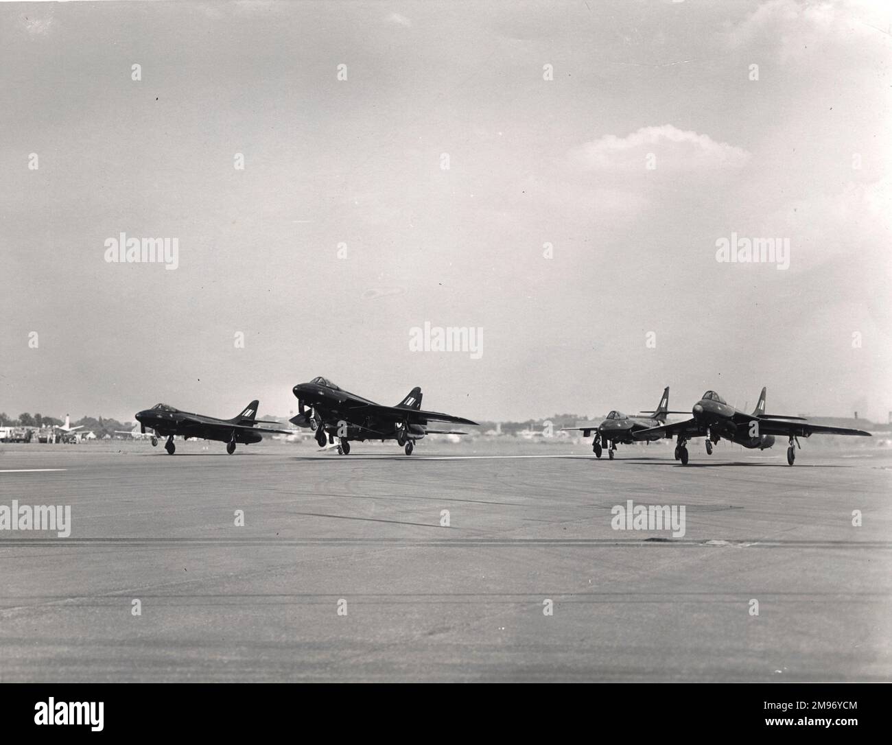 Formation take-off of the glossy all-black Hawker Hunters of 111 (F ...