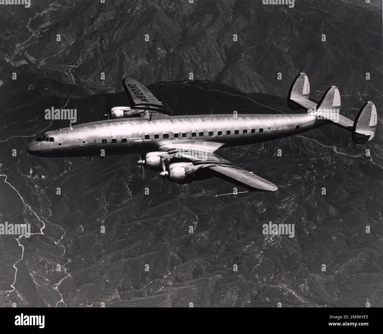 Lockheed Model 1049 Super Constellation, N6201C, in flight. This ...