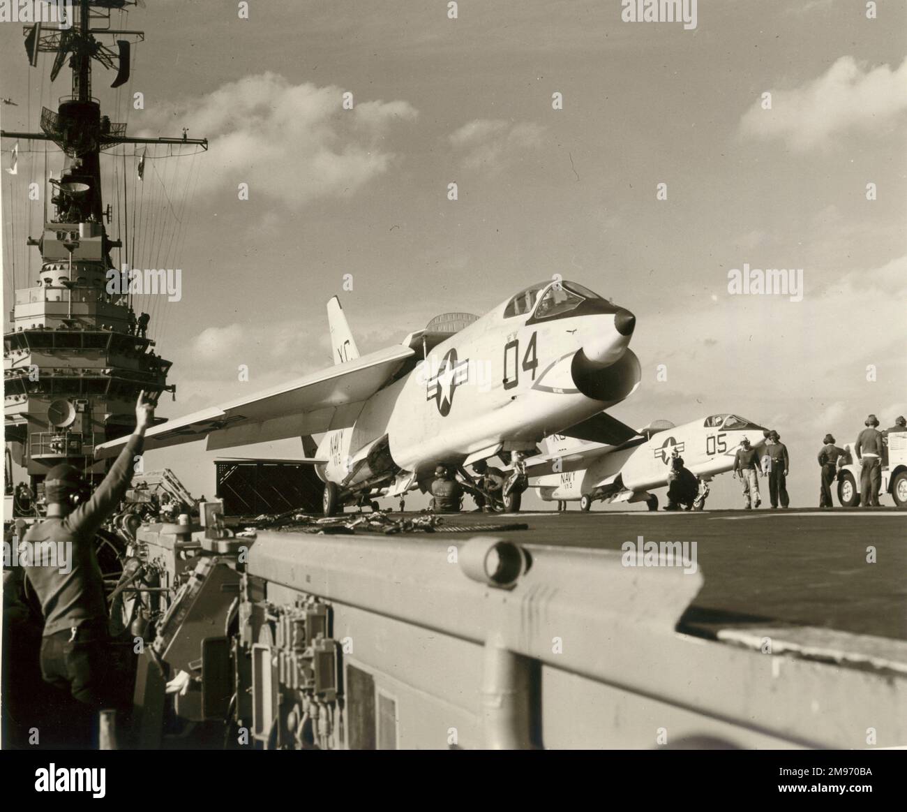 Two Vought F8U Crusaders preparing to catapult off the USS Franklin D ...