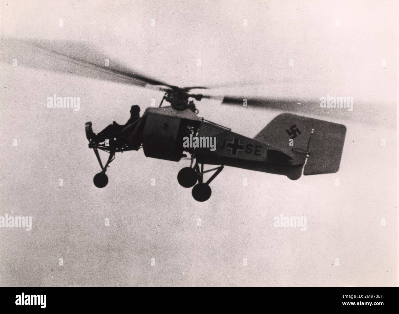 Flettner FL282 Kolibri helicopter in flight. This helicopter had two ...