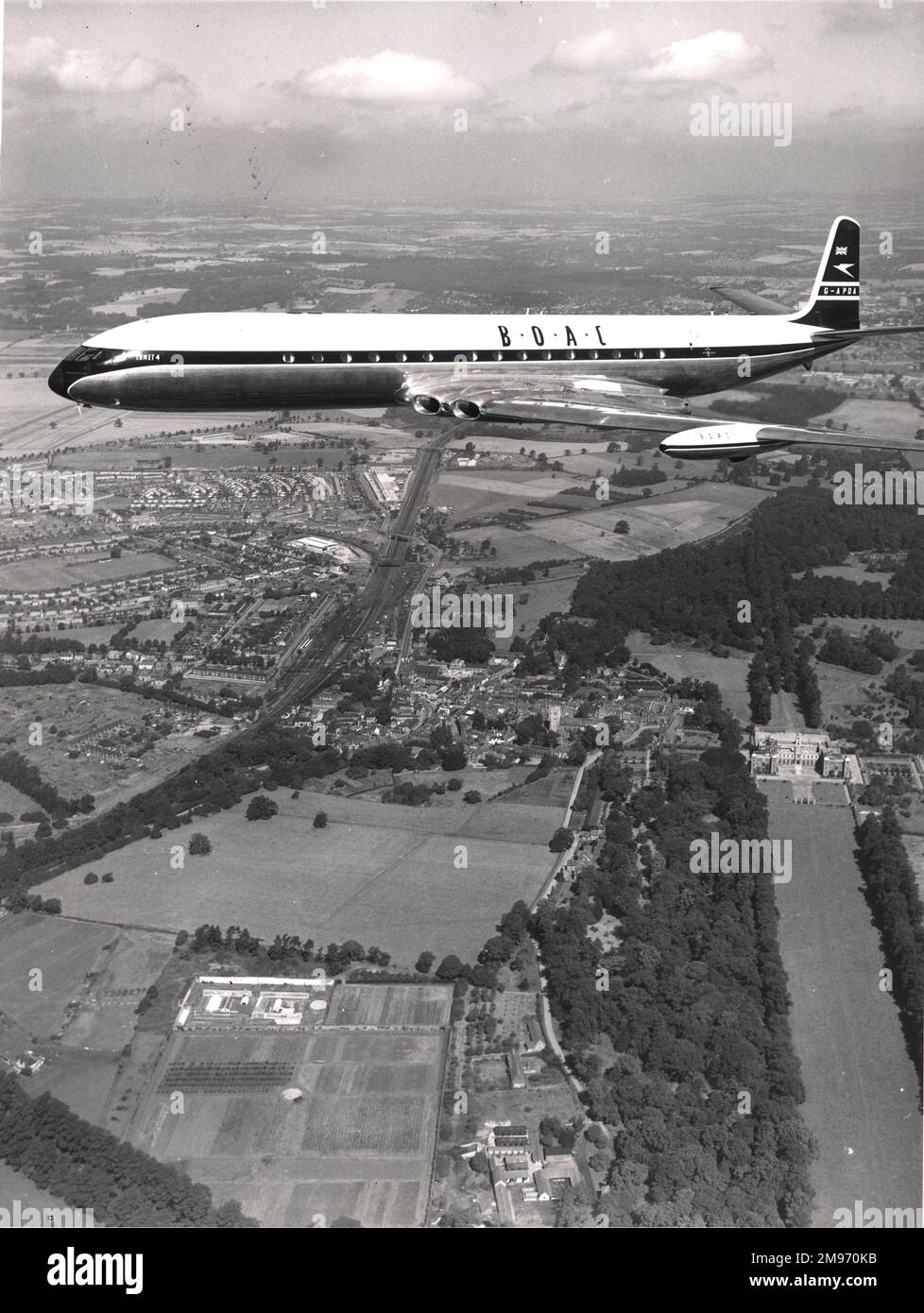 The first de Havilland DH106 Comet 4, G-APDA, of BOAC, over Hatfield ...