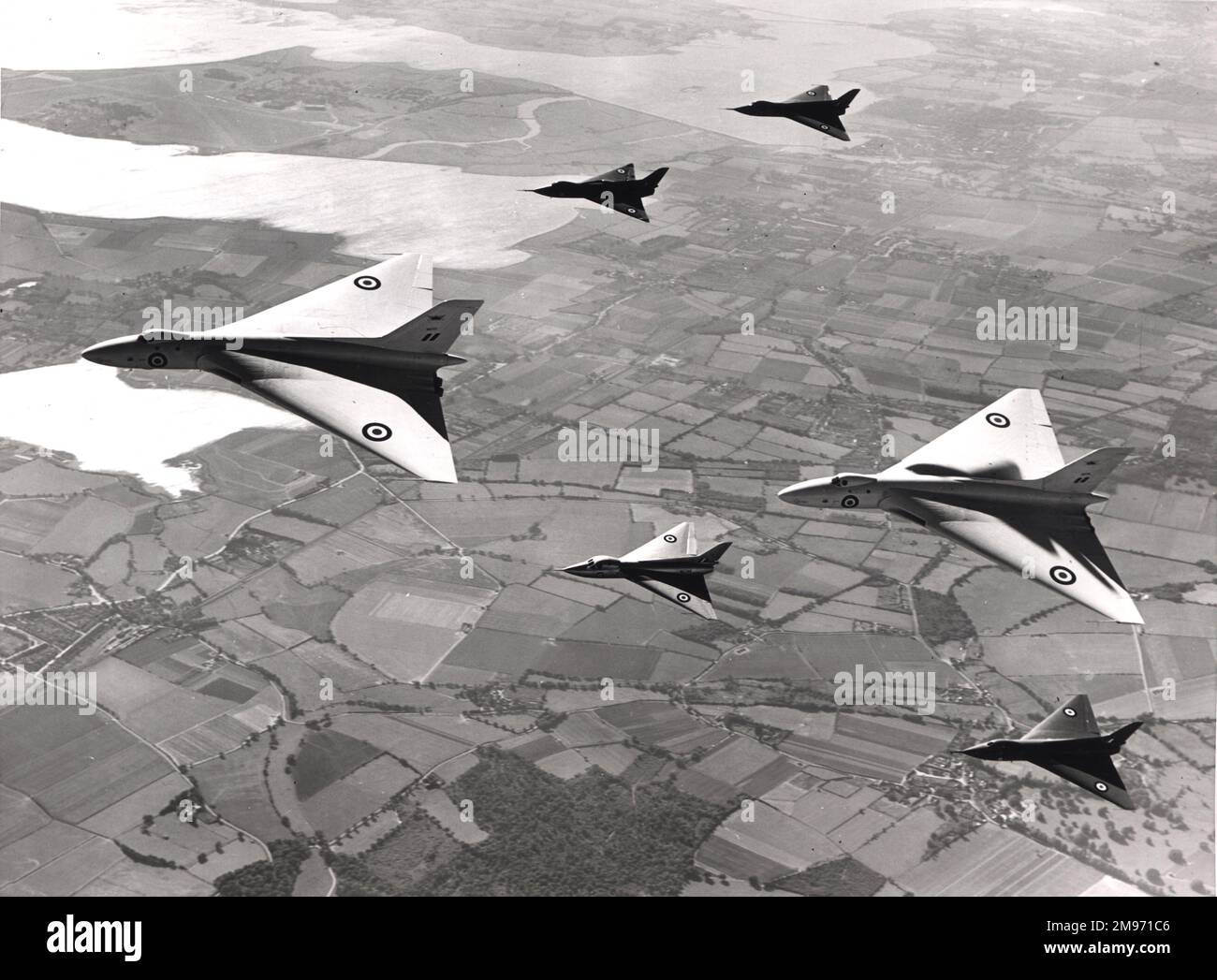 The two Avro Vulcan prototypes, VX770 and VX777, escorted by four Avro ...