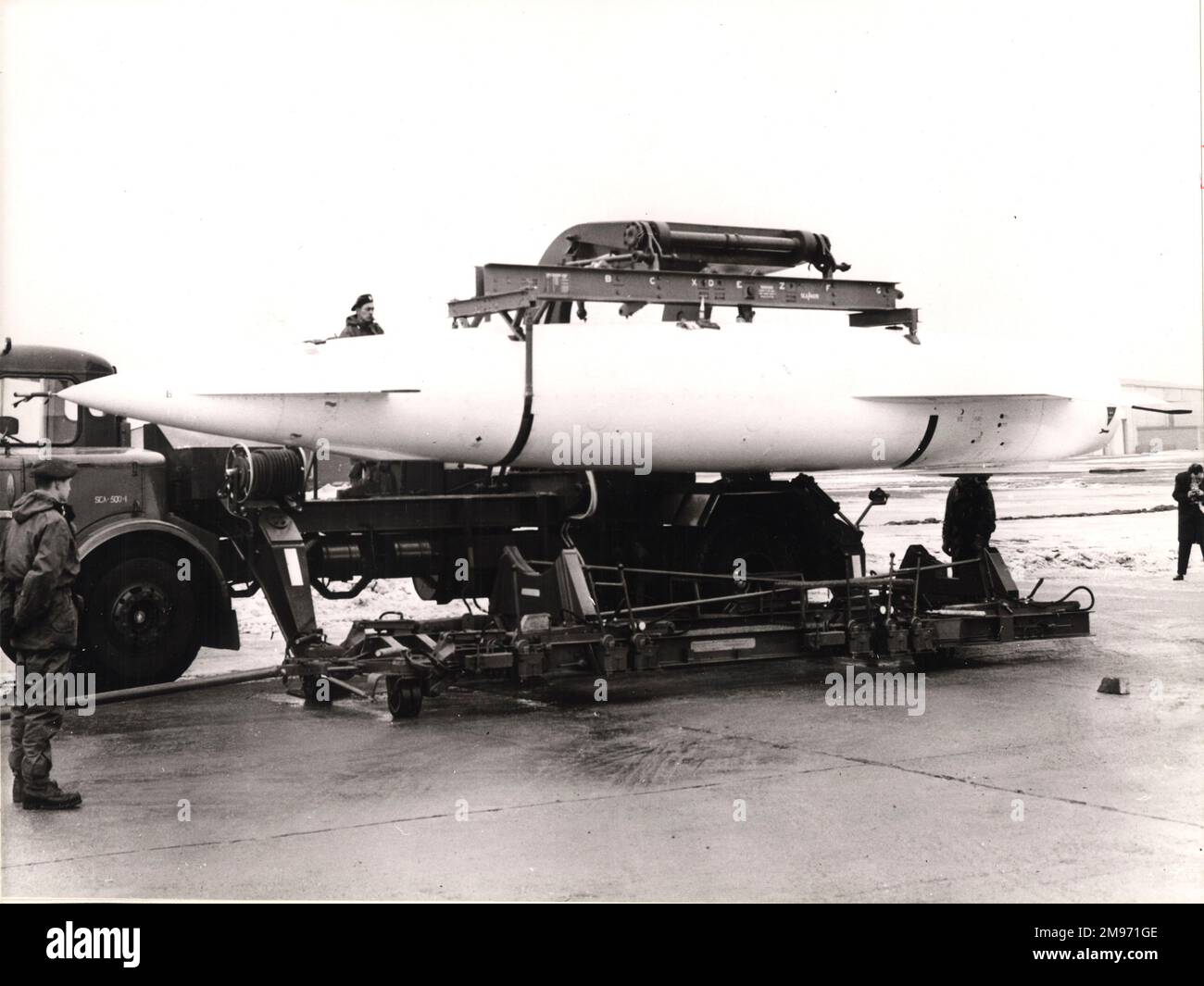 Blue Steel low-loader, trolley and transporter Stock Photo - Alamy
