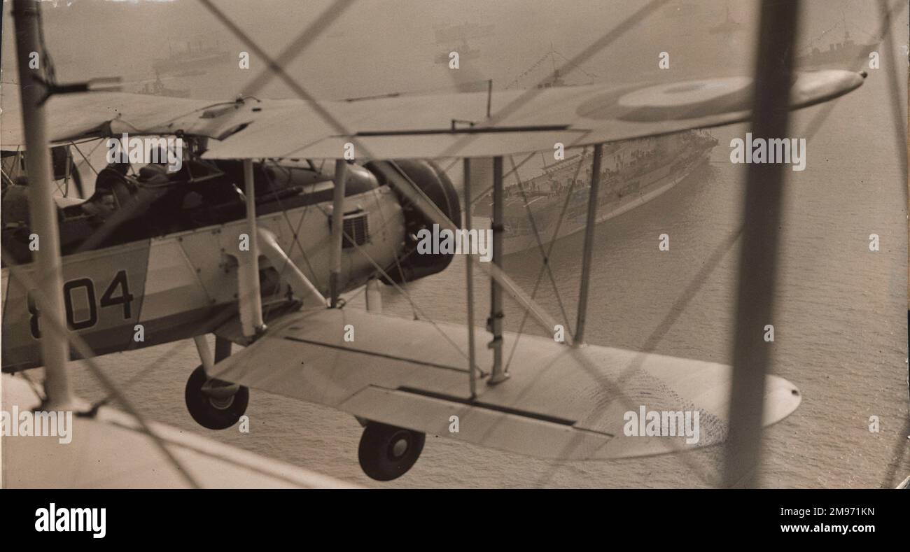 Fairey Swordfish I of No 823 Squadron from HMS Glorious participating in the Coronation Review ...