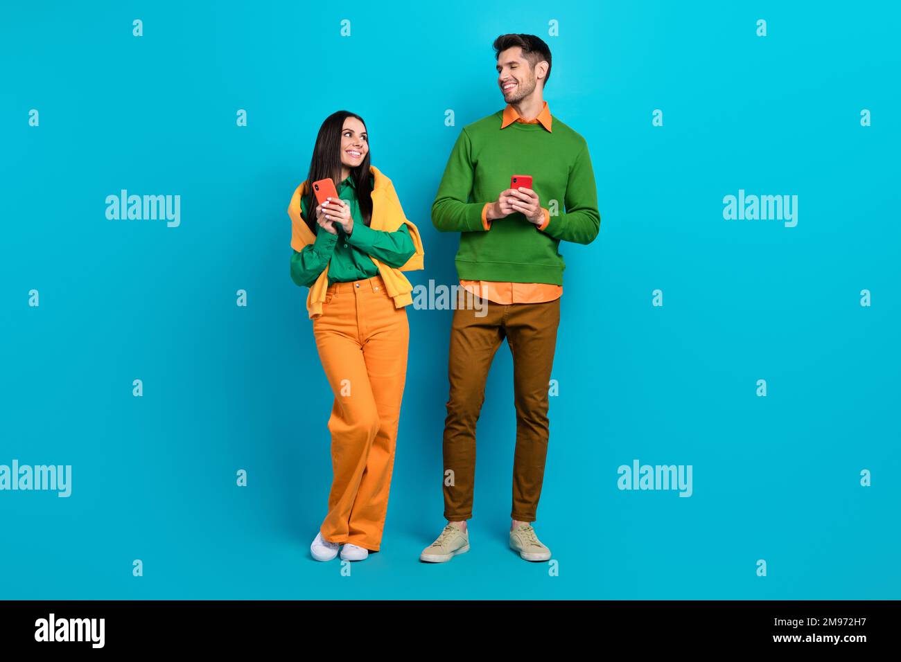 Photo of two bloggers guy lady communicate gadget search facebook ...