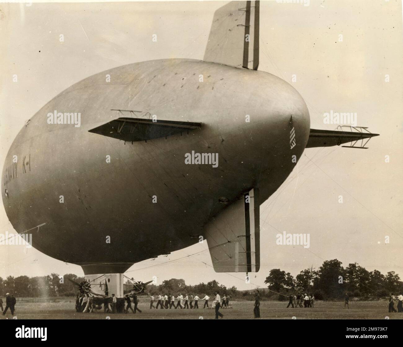 US Navy Goodyear K-1 airship being manoeuvred on the ground Stock Photo ...