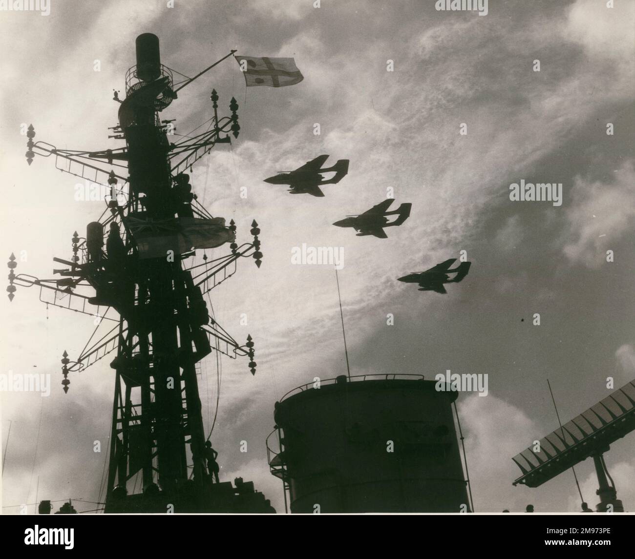 Three de Havilland Sea Vixens of 892 Squadron fly past HMS Centaur ...