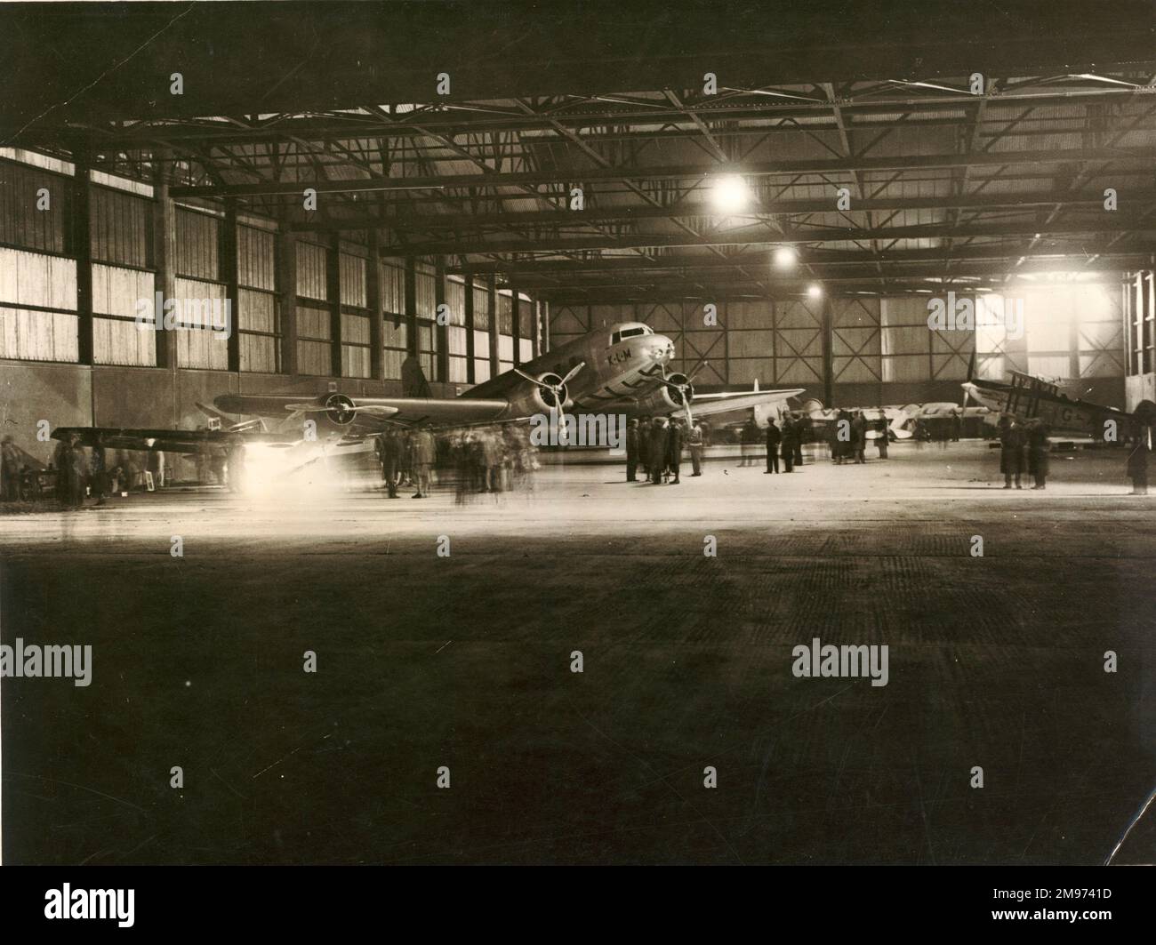 Night-time hangar scene with a Douglas DC-3 of KLM Stock Photo - Alamy