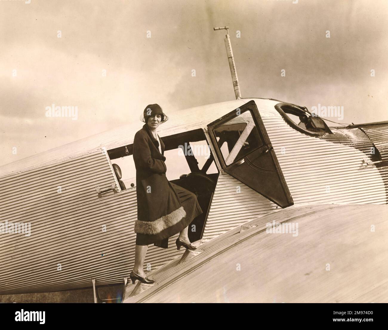Amy Johnson (1903-1941), pioneer British aviator, boarding a Junkers F ...